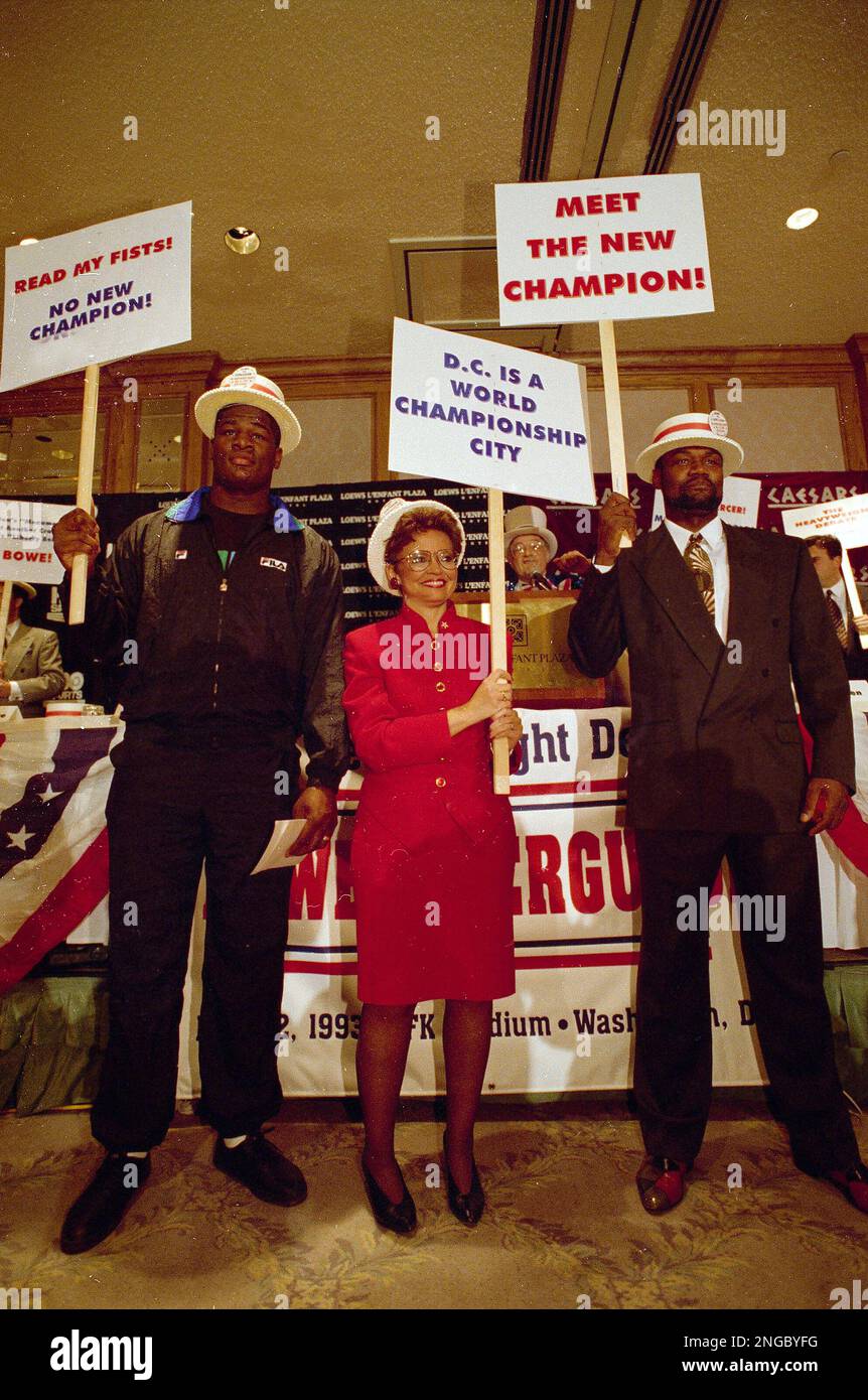 Washington mayor Sharon Pratt Kelly, flanked by heavyweight champion ...