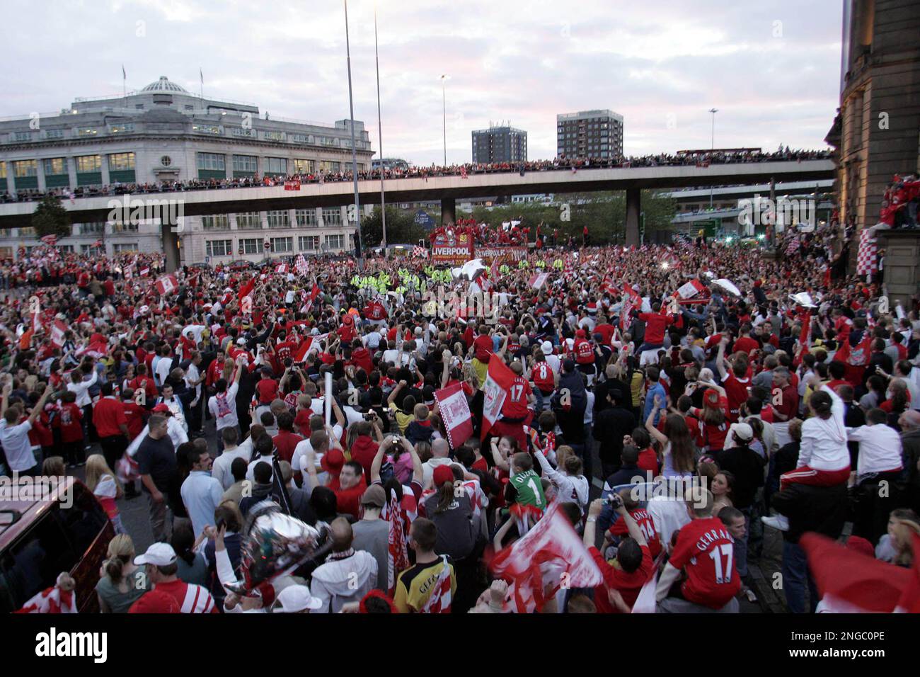 Liverpool football team celebrate with exultant fans as their open top ...