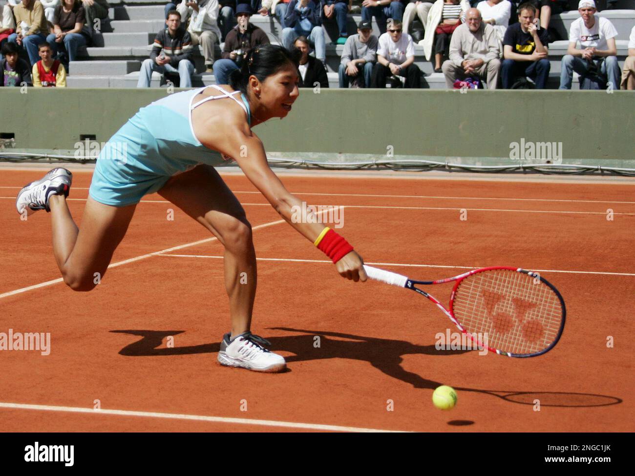 Japan's Shinobu Asagoe runs to return the ball to Germany's Julia ...