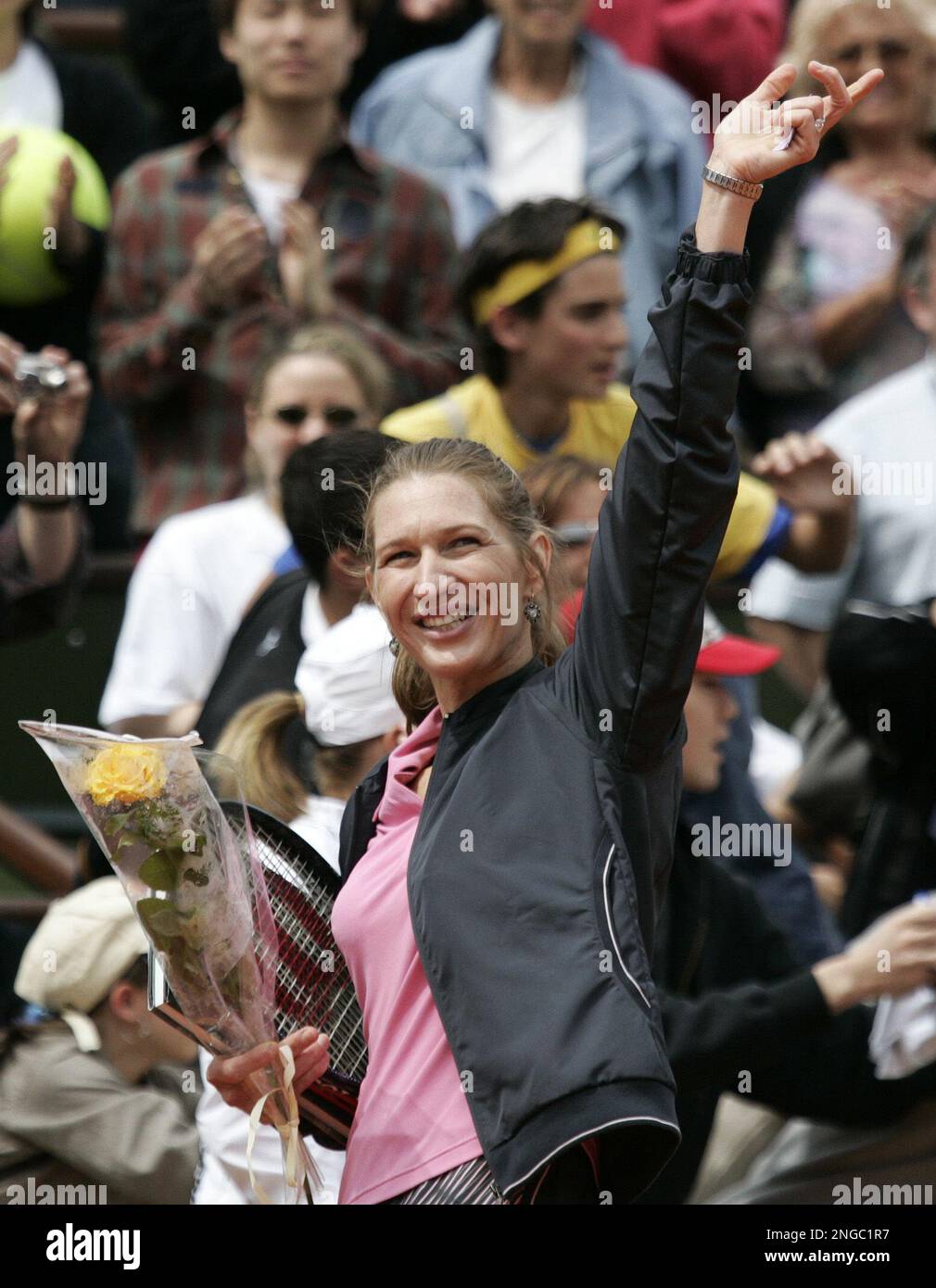Former tennis ace Germany's Steffi Graf waves to the crowd before a ...