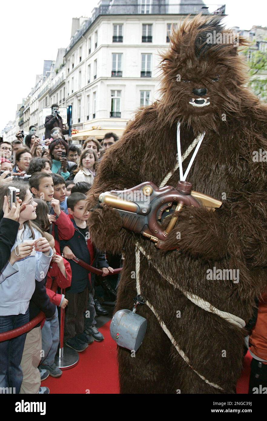 Chewbacca character, right, arrives at the premiere of 'Star Wars ...