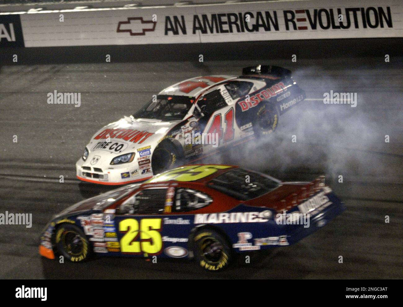 Reed Sorenson (41) slides sideways next to Ashton Lewis Jr. (25) during ...