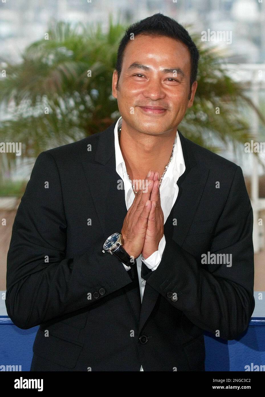 Chinese actor Simon Yam poses for photographers during a photo call for ...