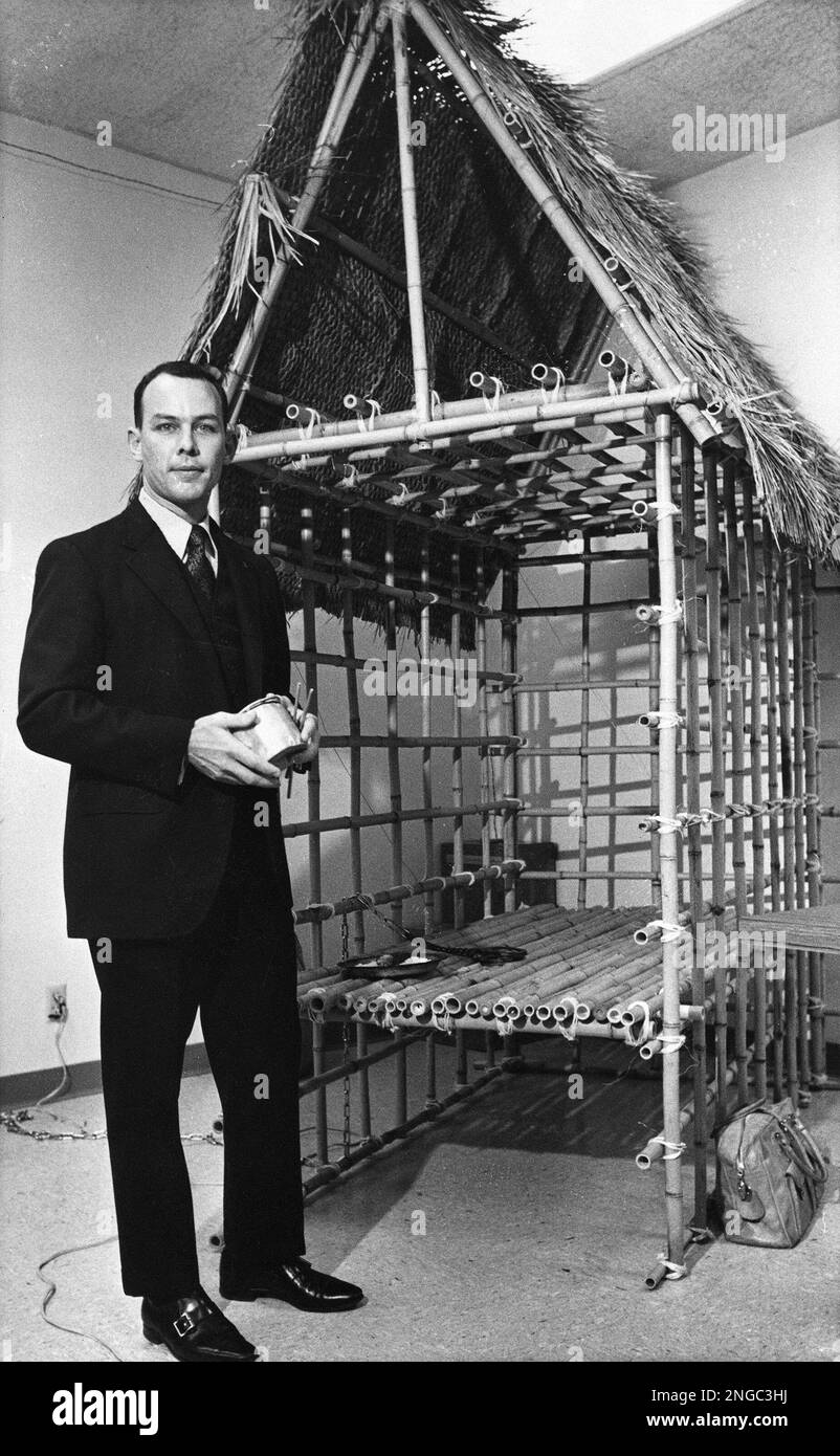U.S. Army Maj. James N. Rowe of McAllen, Texas, stands beside a replica ...