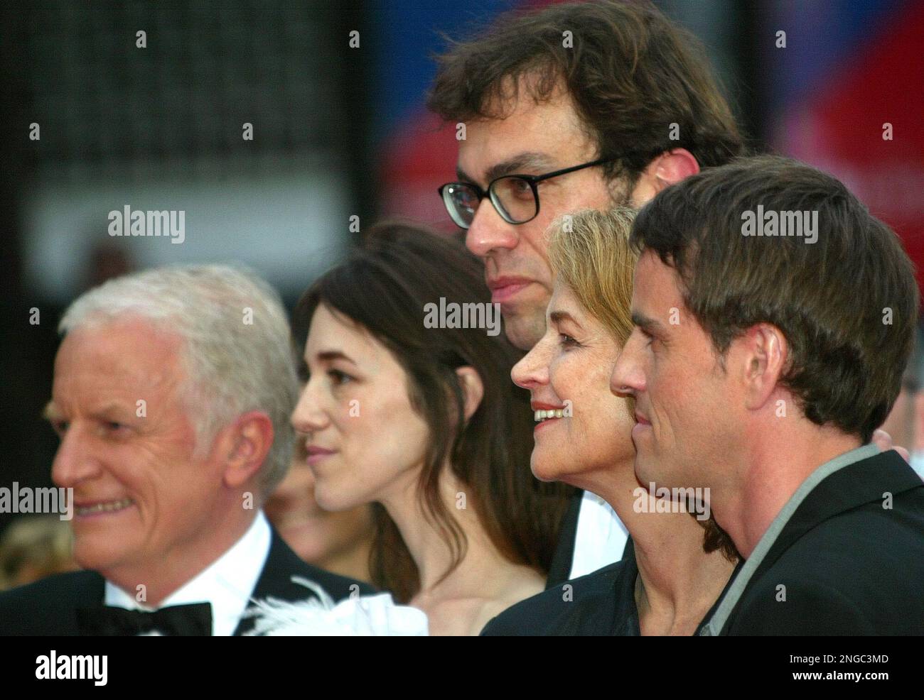 French director Dominik Moll, center, arrives with his French actor ...