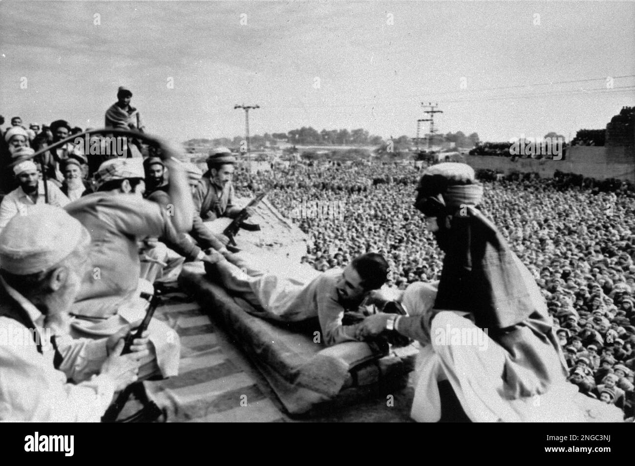Rahat Gul, convicted of theft, is publicly flogged before a crowd of ...
