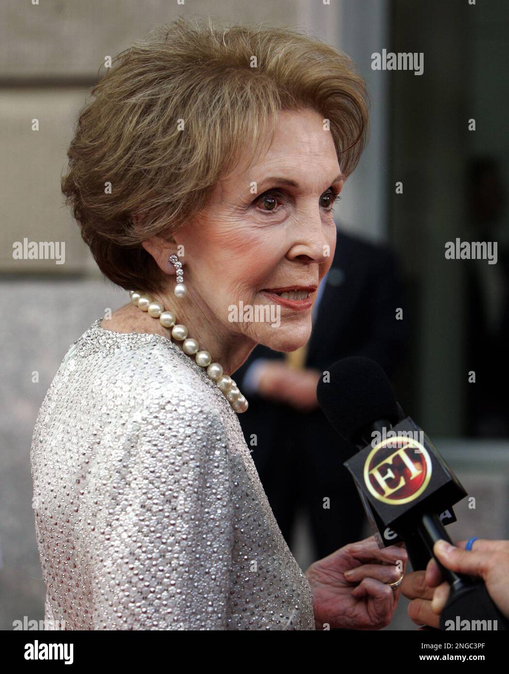 Former first lady Nancy Reagan talks to a reporter as she arrives at ...