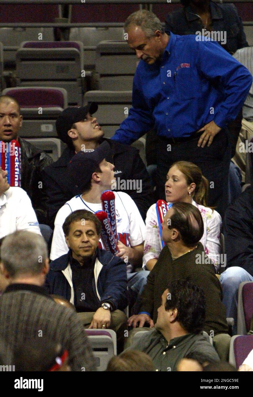 ** ADDS ID OF FANS AND CLARIFIES CHARGES ** Michael A. Roberts,3 back ...