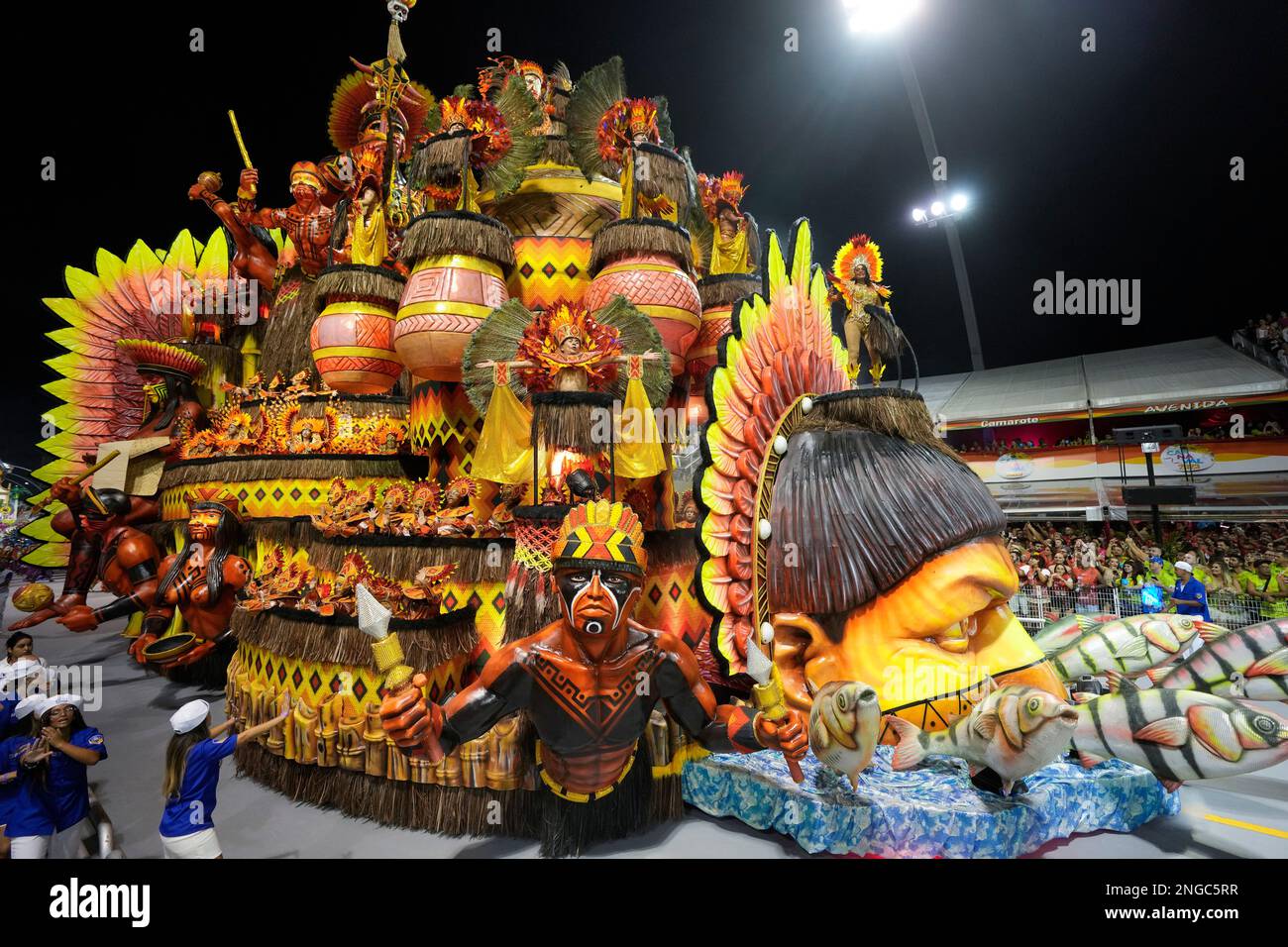 Dancers from the Academicos do Tatuape samba school perform on a float ...