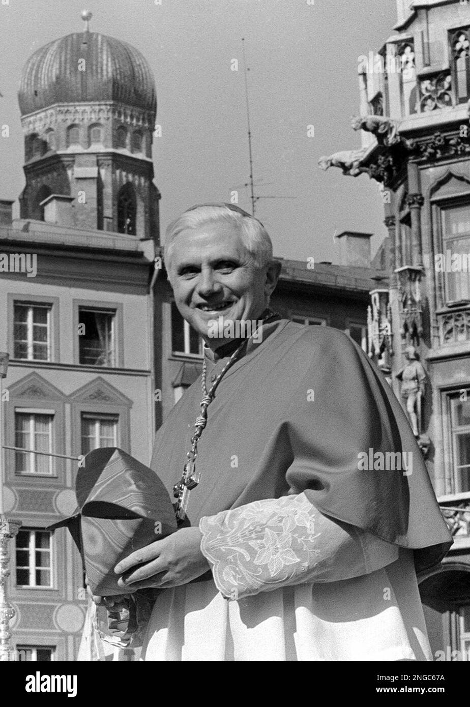 With the cuppolas of Munich's cathedral in rear, Joseph Cardinal ...