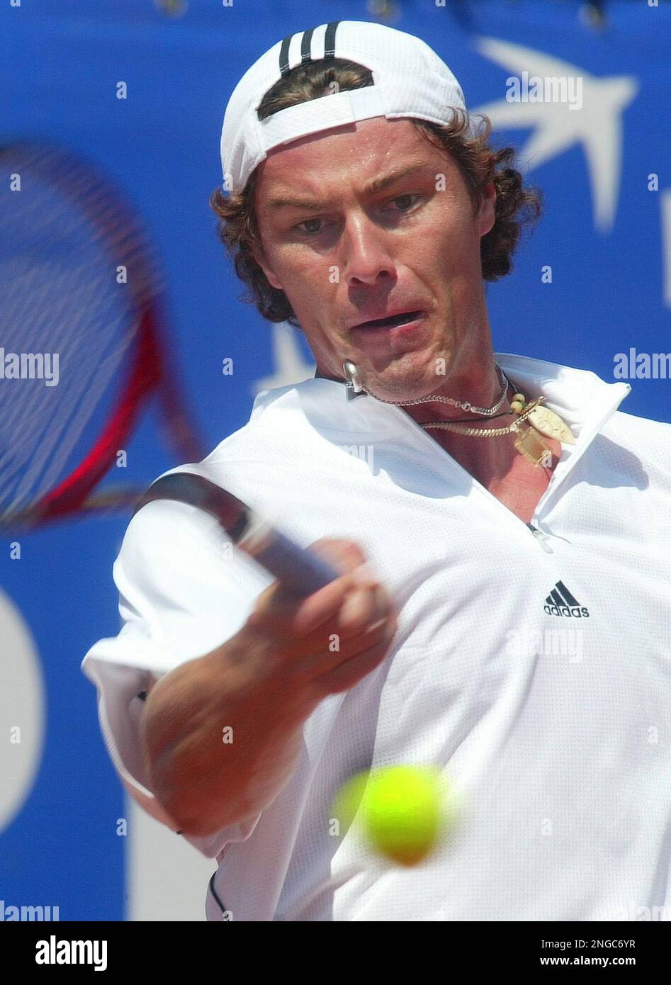 Russia's Marat Safin plays a return to Cyril Saulnier of France during ...