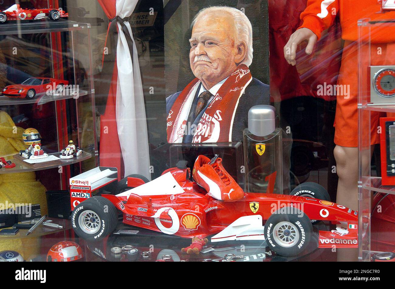 The picture of late Prince Rainier III and the flag of Monaco tied with ...