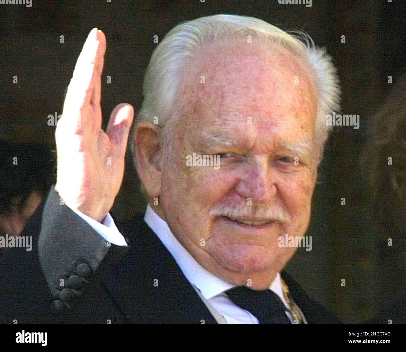 Prince Rainier of Monaco waves to the crowd during the Monaco National ...