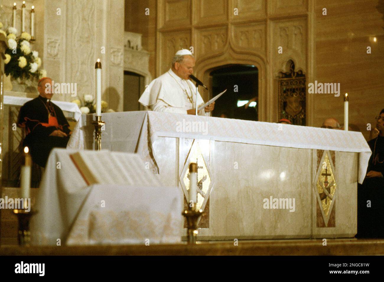 Pope John Paul II celebrates mass at the Church of St. Peter with John ...