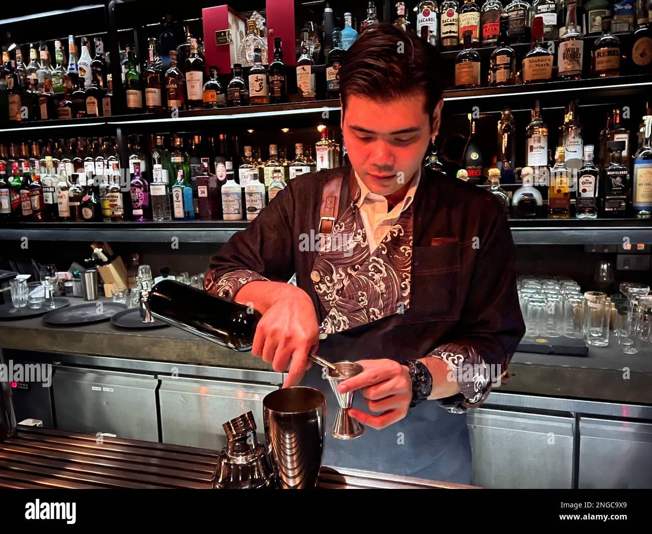 Bangkok, Thailand. 10th Feb, 2023. Head bartender Ong mixes a drink at ...