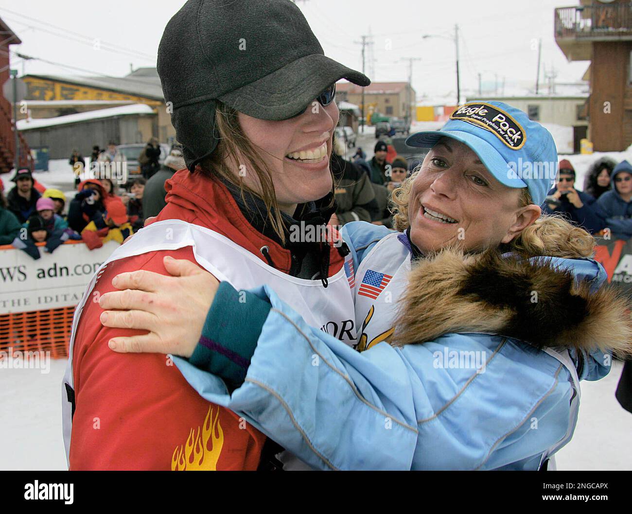 Aliy Zirkle, from Two Rivers, Alaska, left, gets a hug from DeeDee ...