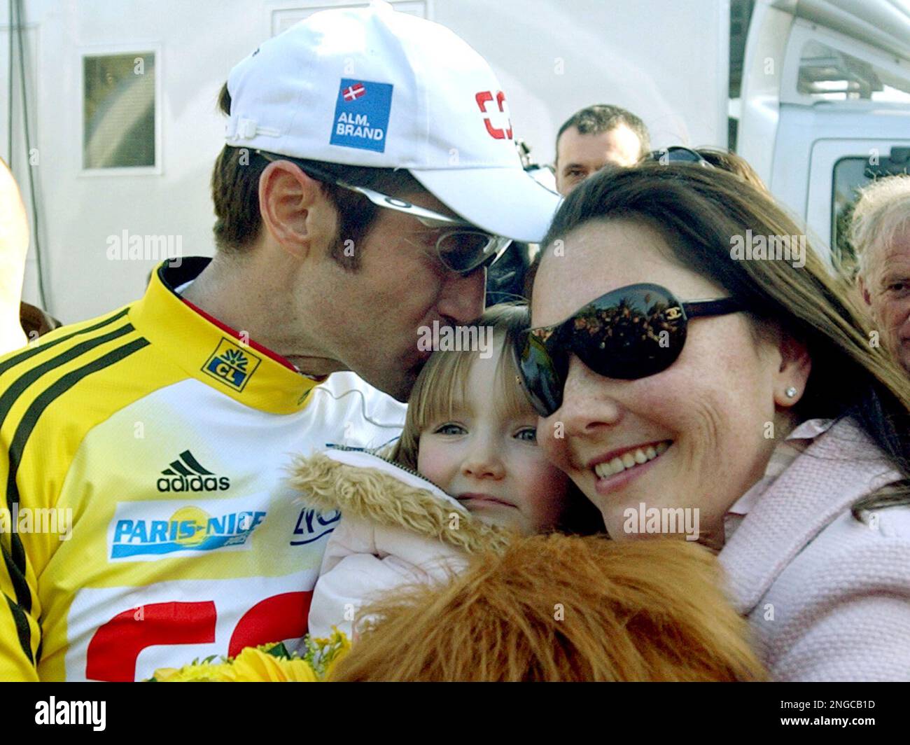 Bobby Julich of the U.S. kisses his daughter Olivia, center with his ...