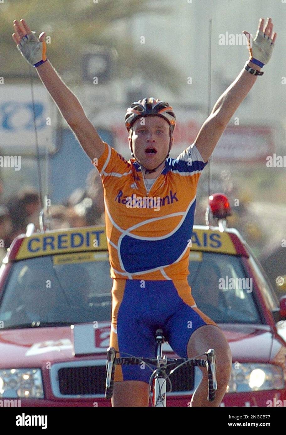 Joost Posthuma of the Netherlands celebrates as he crosses the finish ...