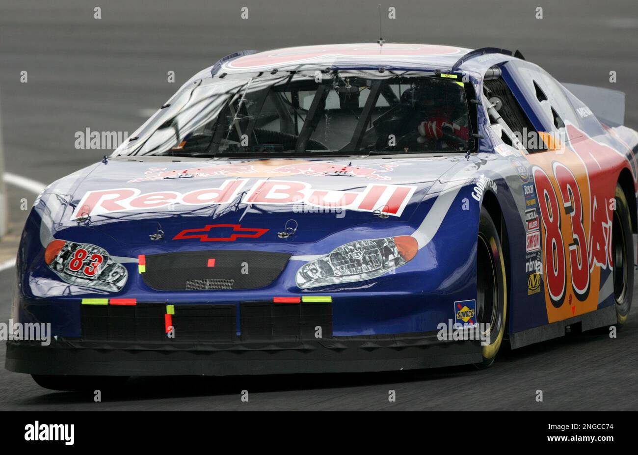 Driver Robby Gordon of the Red Bull Chevrolet team drives his car ...