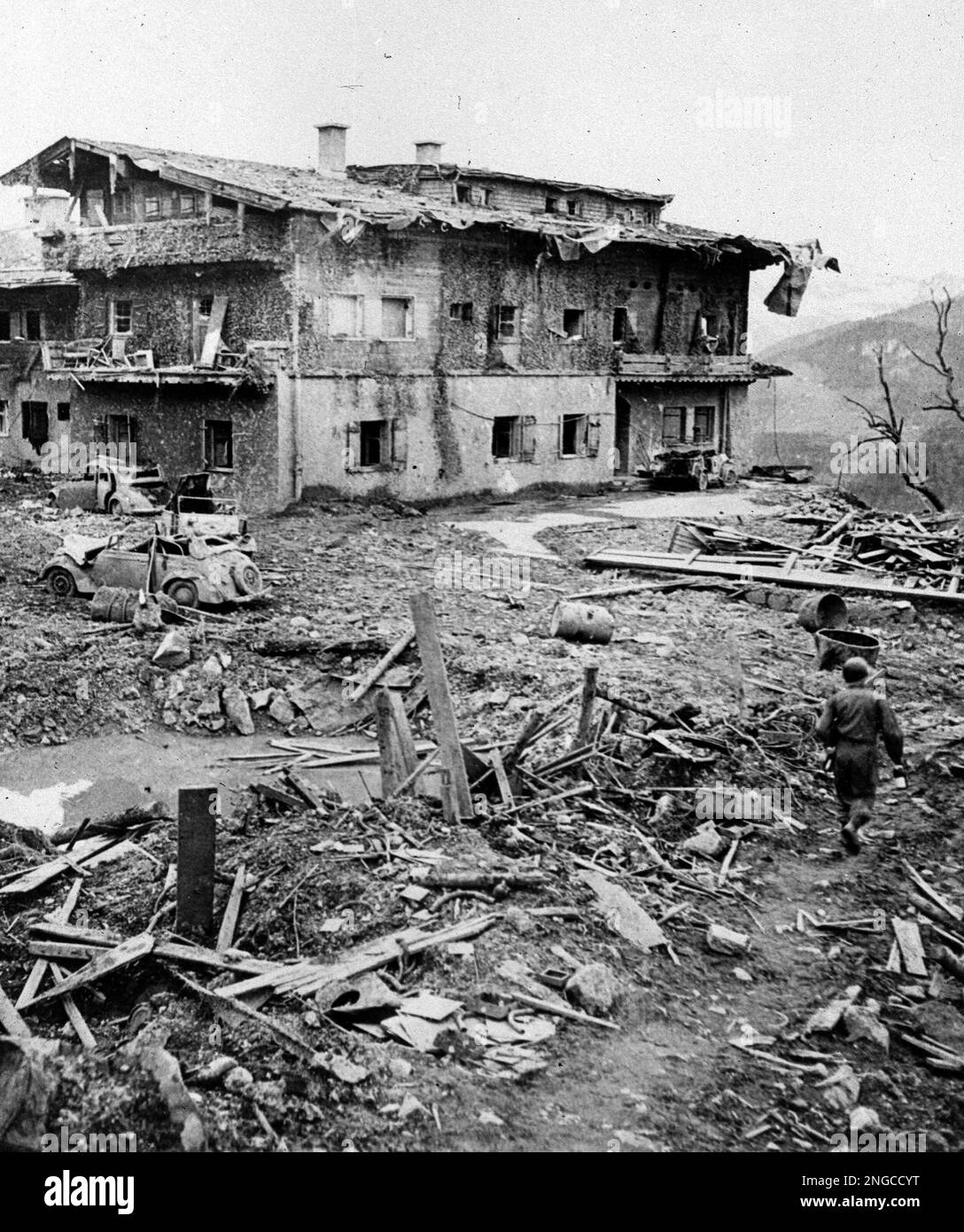 Shell holes and wrecked cars litter the grounds of Hitler's mountain ...
