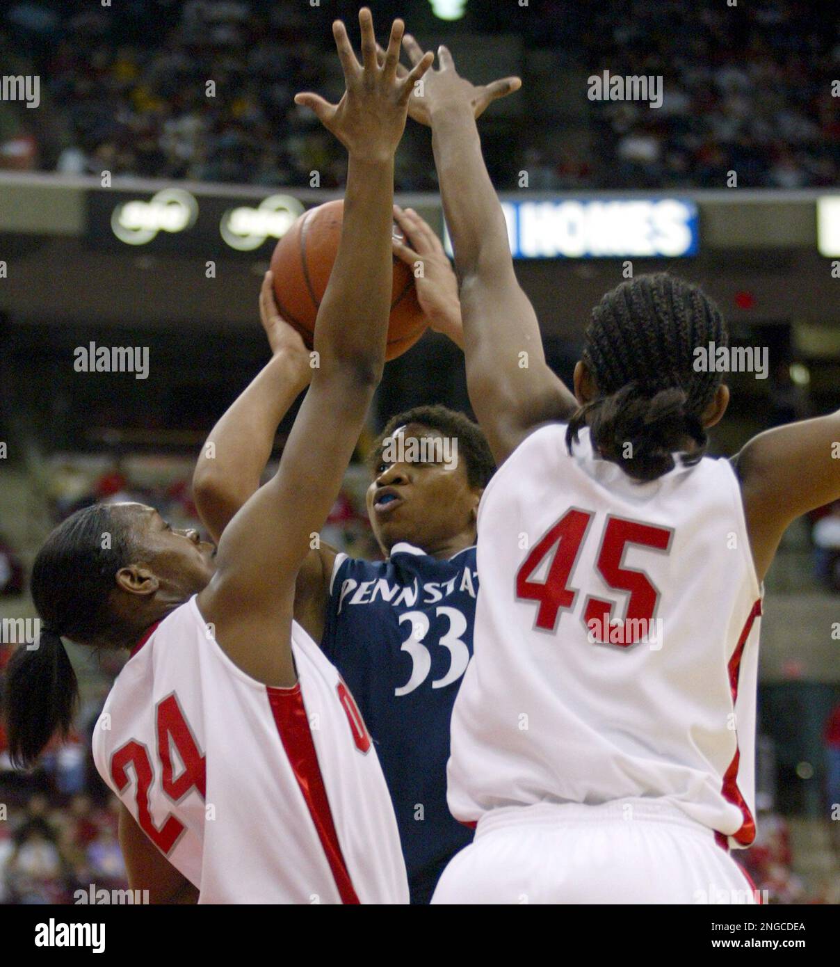 Penn State's Tanisha Wright (33) takes a shot while being defended by ...