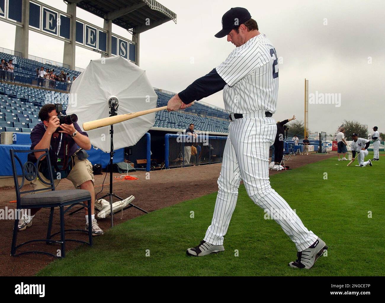 New York Yankees first baseman Jason Giambi poses with his bat for ...