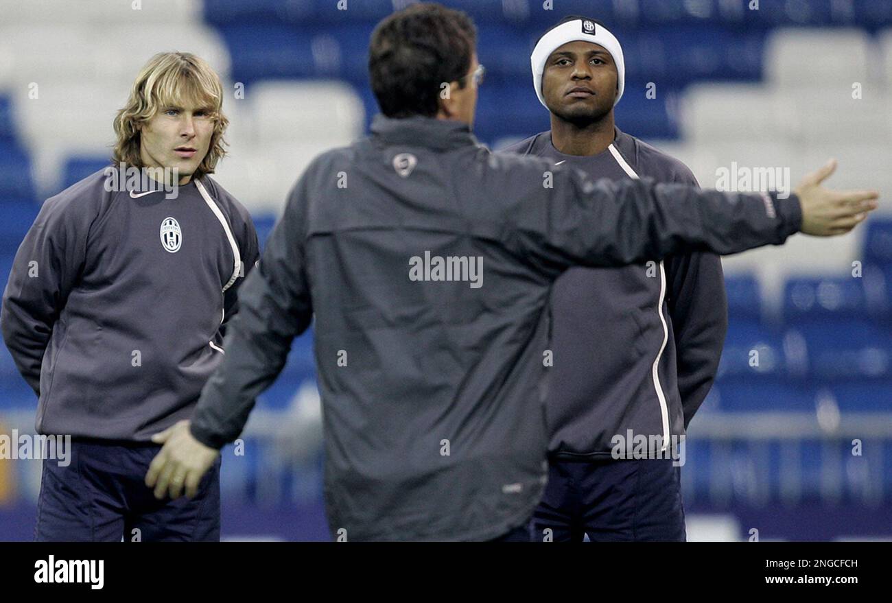 Juventus players Pavel Nedved, left, from the Czech Republic stands ...