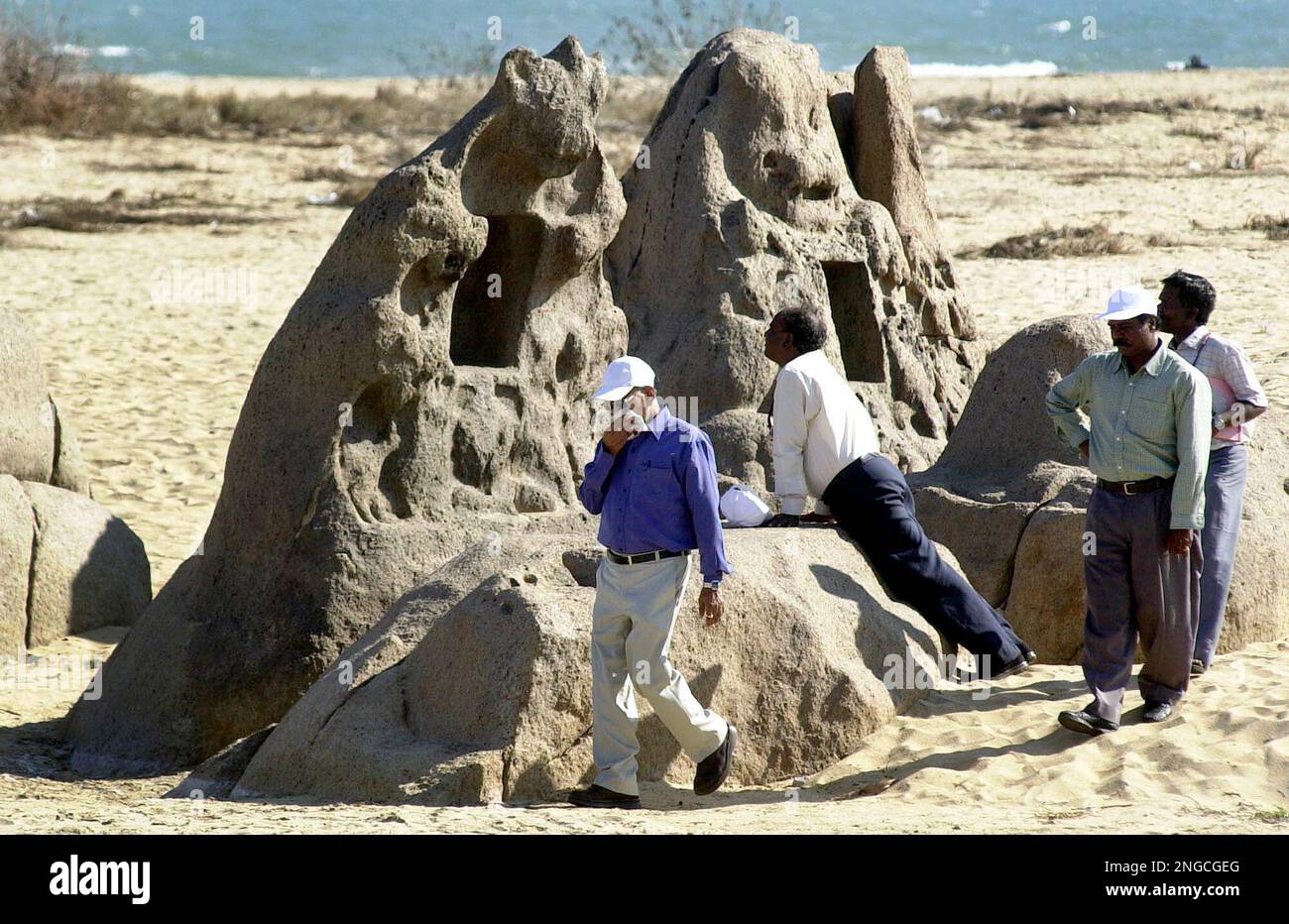 Officials from the Archeological Survey of India investigate an ancient ...