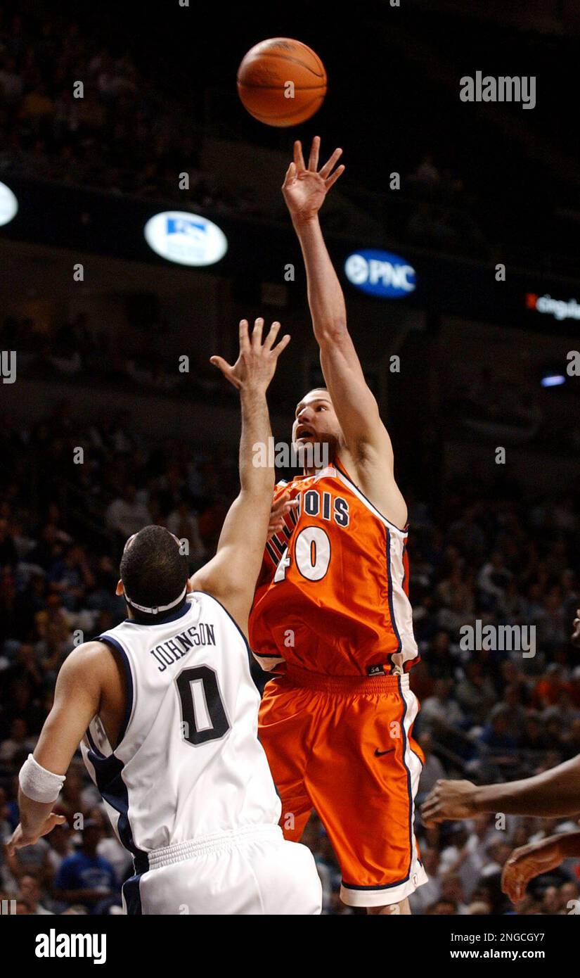 Illinois forward James Augustine shoots over Penn State's Aaron Johnson ...