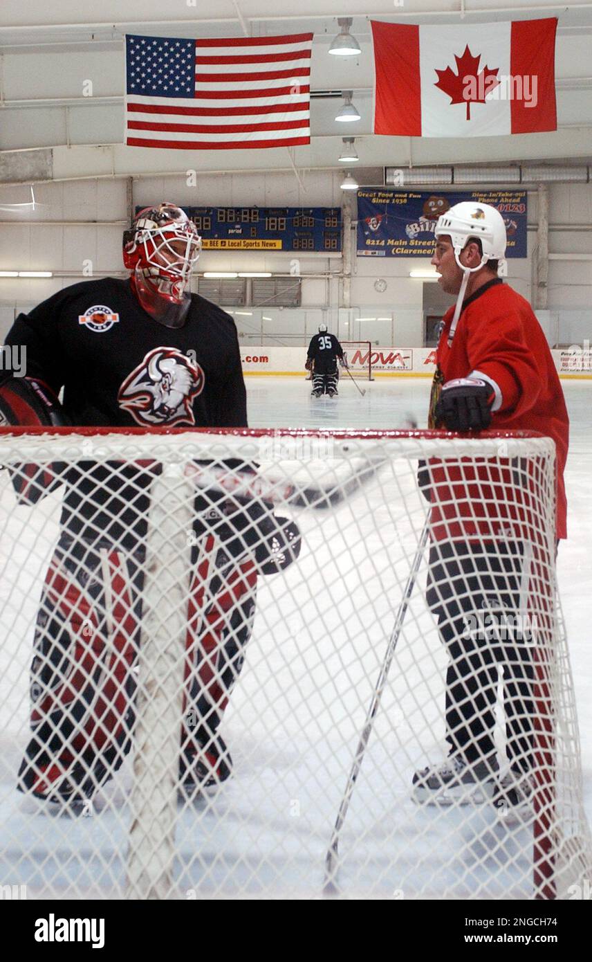 Buffalo Sabres goalie Martin Biron talks with Chicago Blackhawks ...