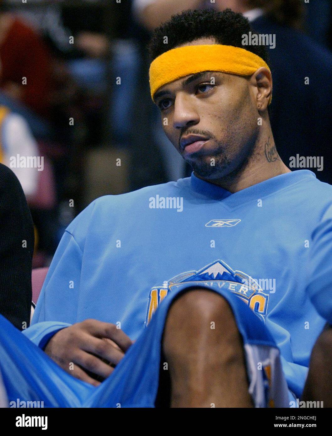 Denver Nuggets' Kenyon Martin looks on from the bench during the fourth ...