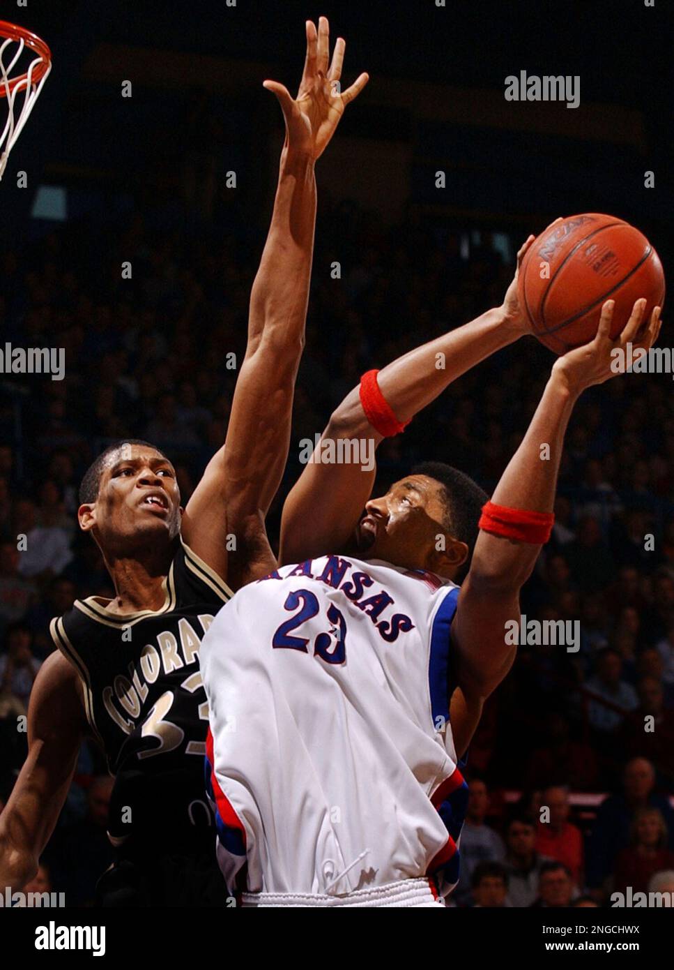 Kansas forward Wayne Simien (23) shoots over Colorado forward Julius ...
