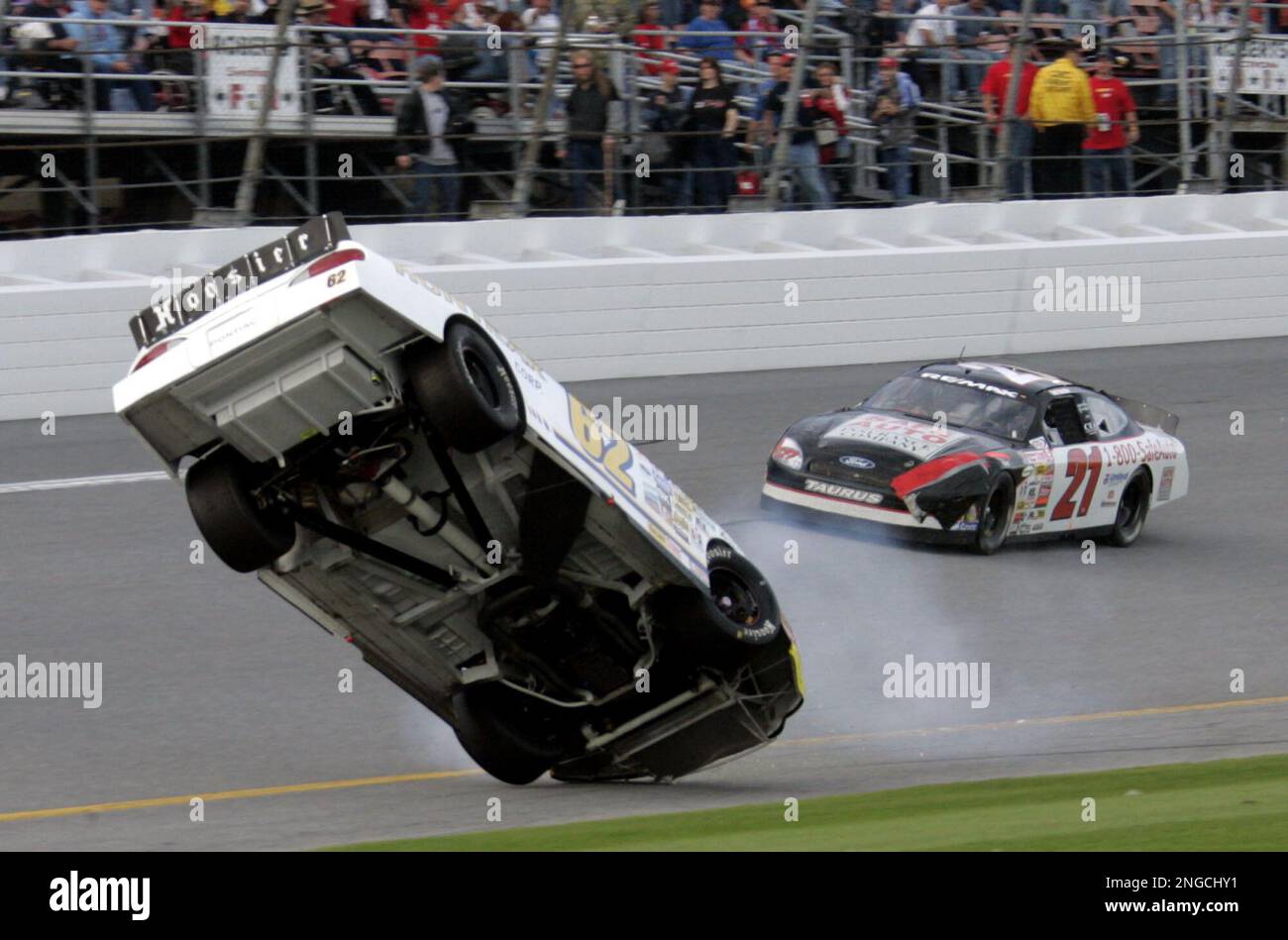 Clair Zimmerman's car, left, slides along its nose during a crash in ...