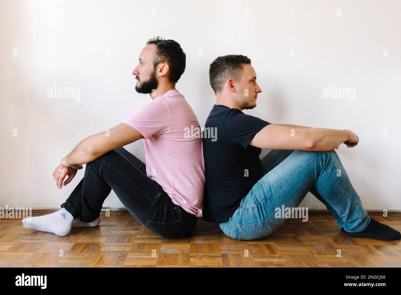 Gay men back sitting hi-res stock photography and images - Alamy