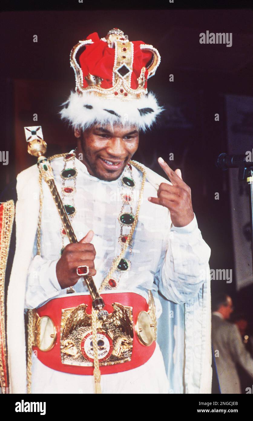 Heavyweight Champion Mike Tyson celebrates his victory over Tony Tucker ...