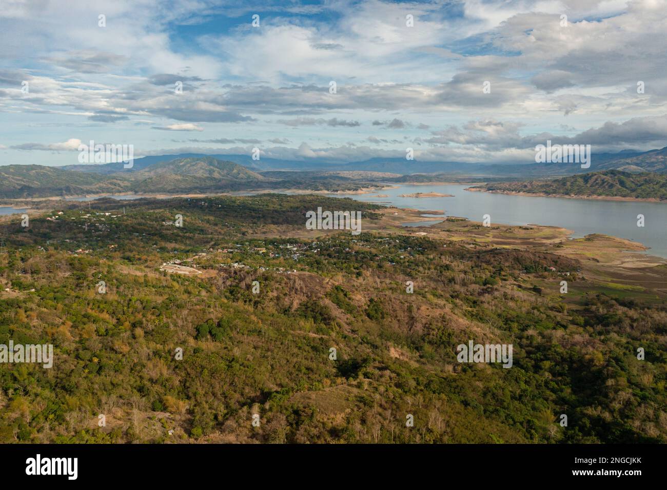 Lake in a valley among mountains with tropical vegetation. Philippines ...