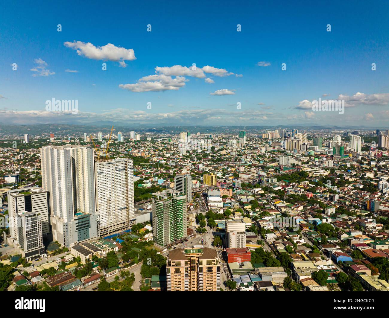 Manila is the capital of the Philippines with modern buildings and ...