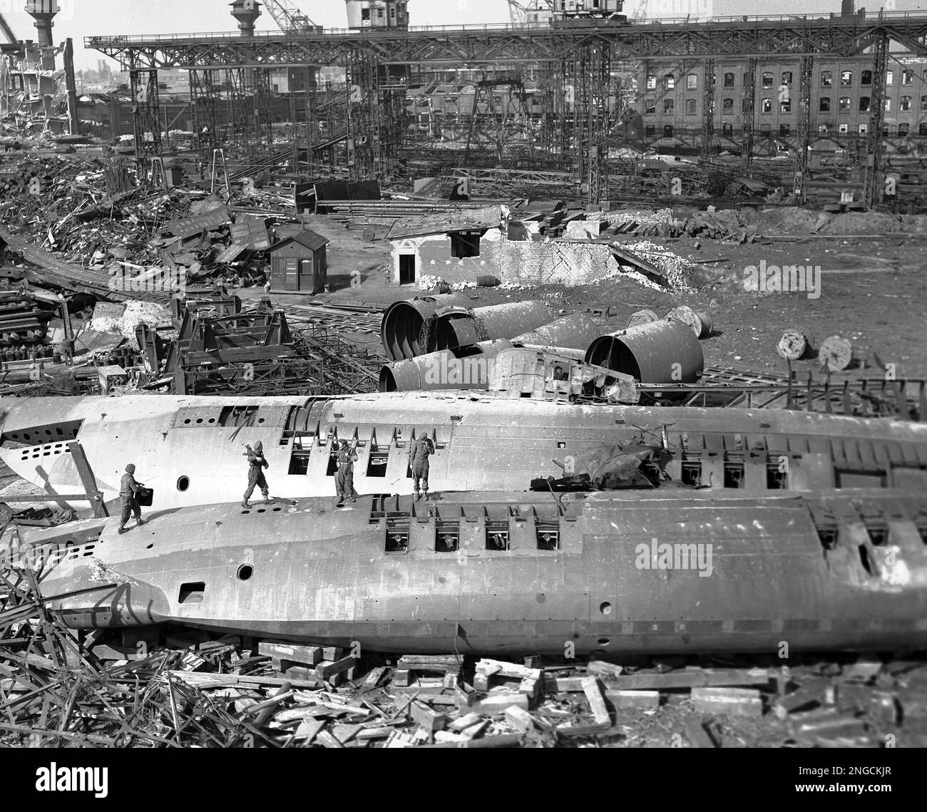 Wrecked submarines, in various stages of prefabrication, litter the ...