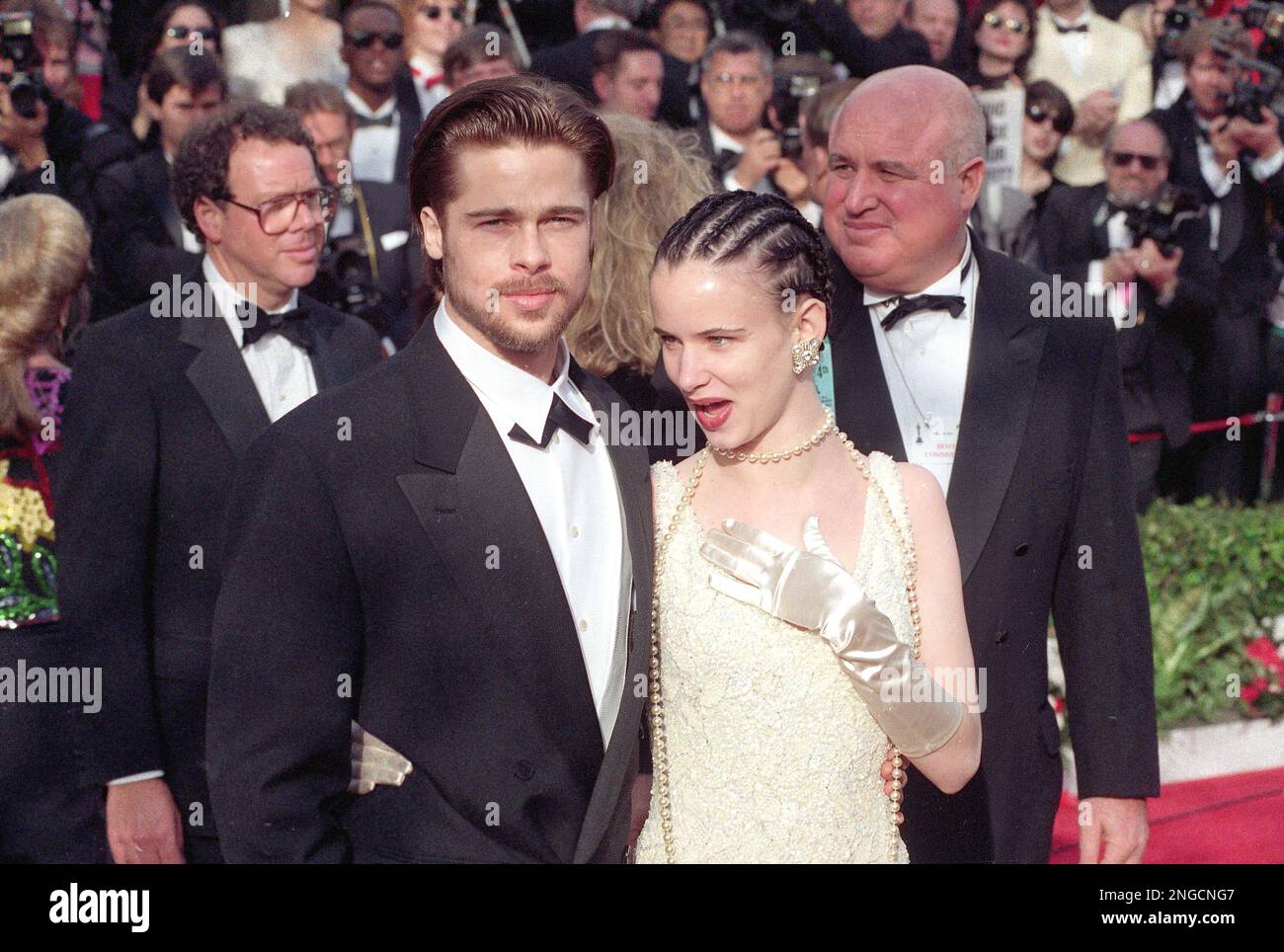 Actor Brad Pitt Left And Actress Juliette Lewis Arrive At The 64th
