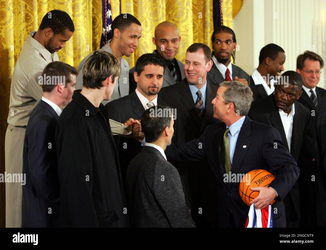 President Bush shakes hands with Rasheed Wallace, top left, as his ...