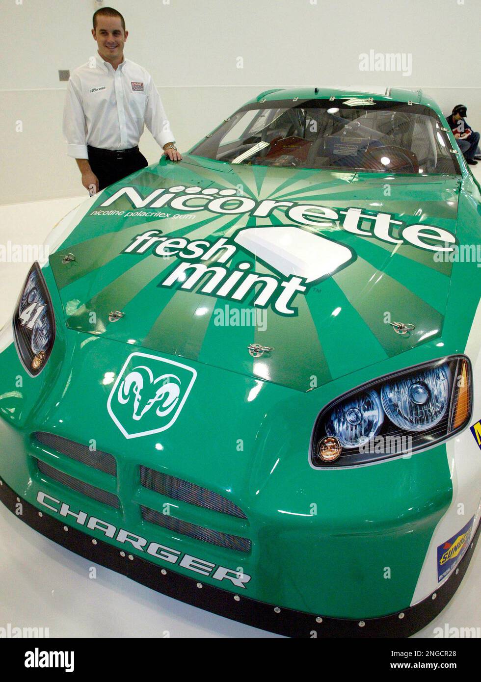 NASCAR driver Casey Mears poses by his Nicorette-sponsored race car ...
