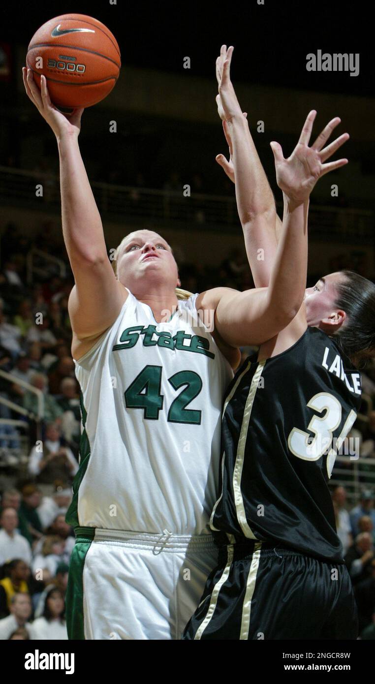 Michigan State's Kelli Roehrig (42) shoots against Purdue's Erin ...