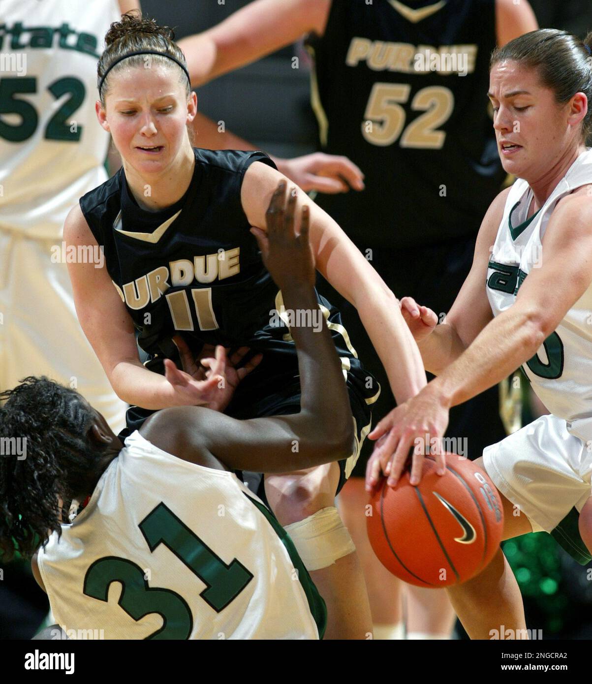 Michigan State's Victoria Lucas-Perry (31) and Lindsay Bowen, right ...