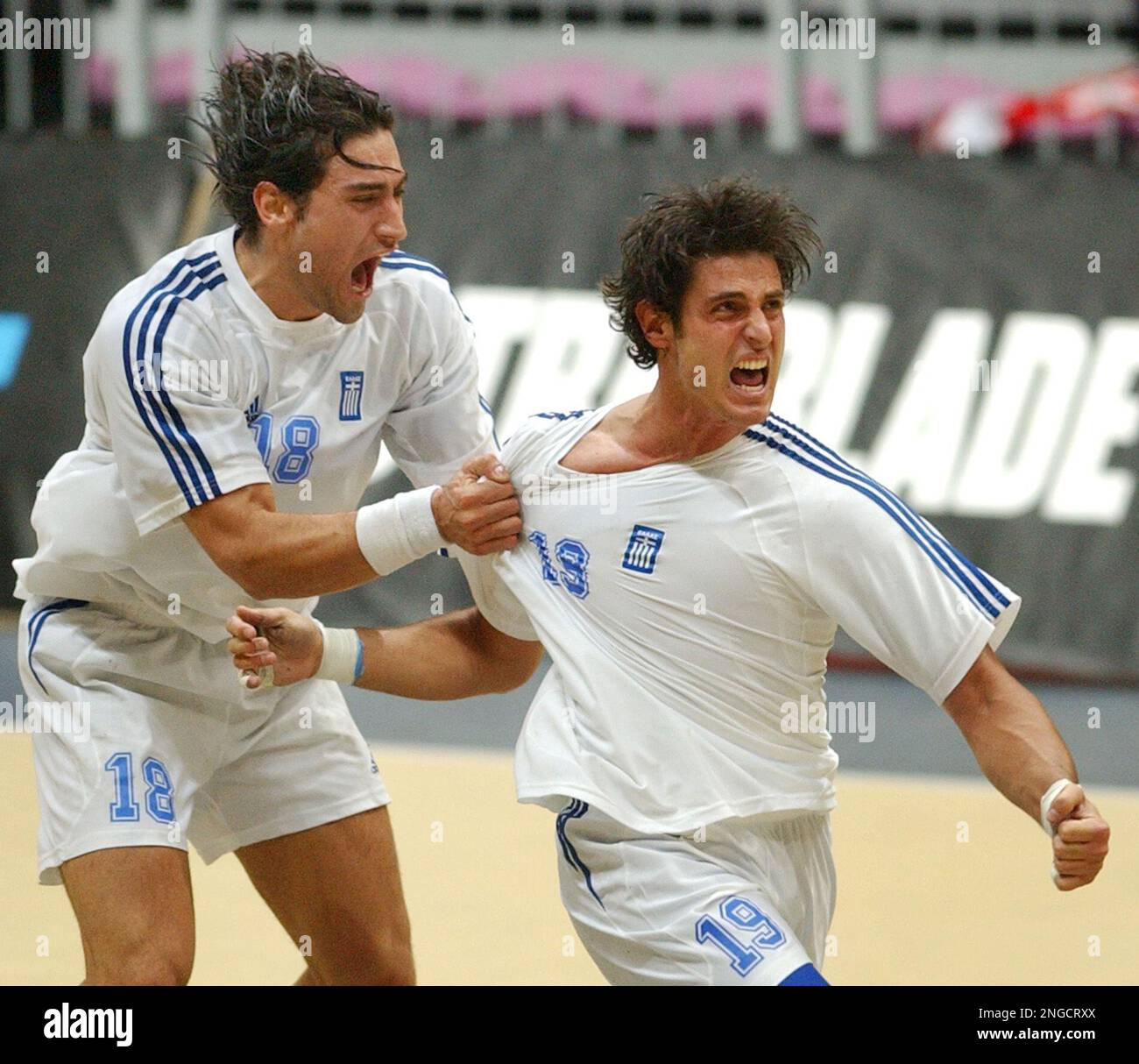 Greek player Alexandros Alvanos, right, is congratulated by teammate ...