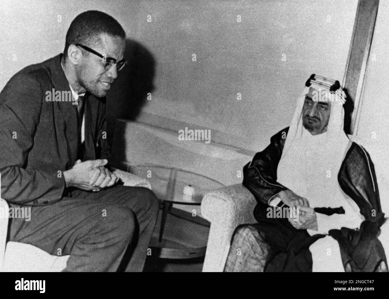 Malcolm X, left, African-American black muslim leader, is shown with ...