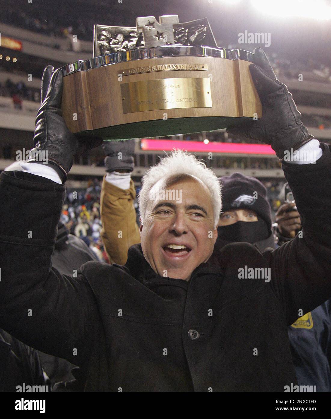 Philadelphia Eagles owner Jeffrey Lurie holds up the NFC Championship ...