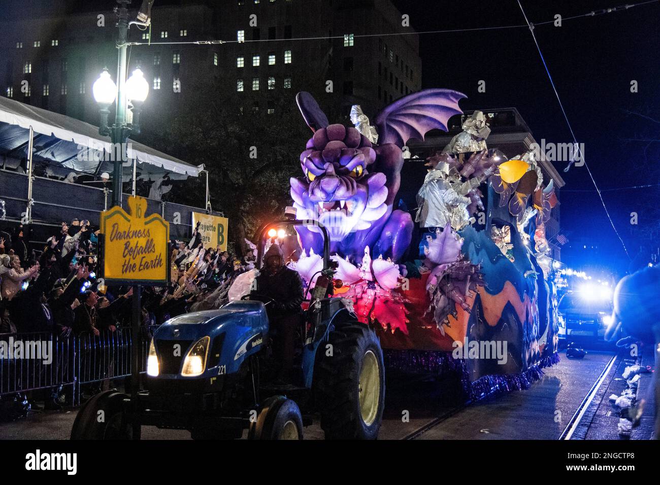 Paradegoers are seen at the Krewe of Hermes Parade during Mardi Gras on ...