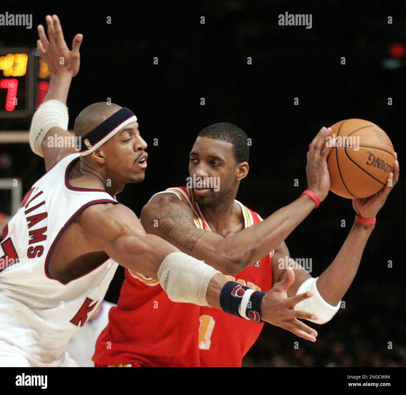 Houston Rockets Tracy McGrady looks to pass around New York Knicks ...