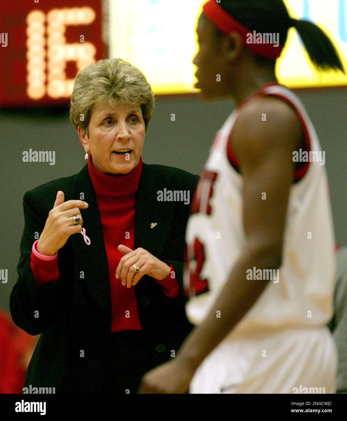 North Carolina State coach Kay Yow, left, instructs her team from the ...