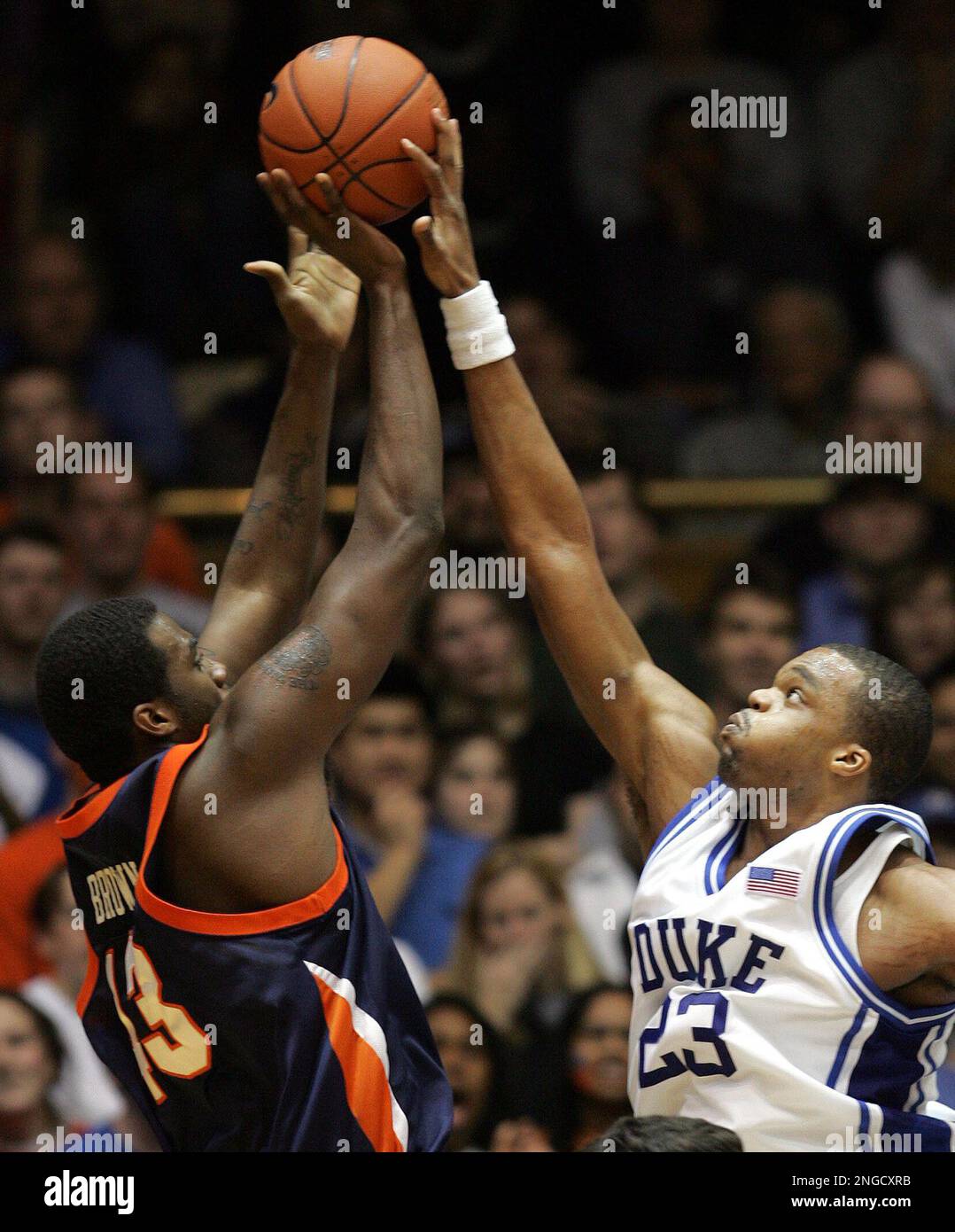 Duke's Shelden Williams, right, gets his hand on a shot by Virginia's ...